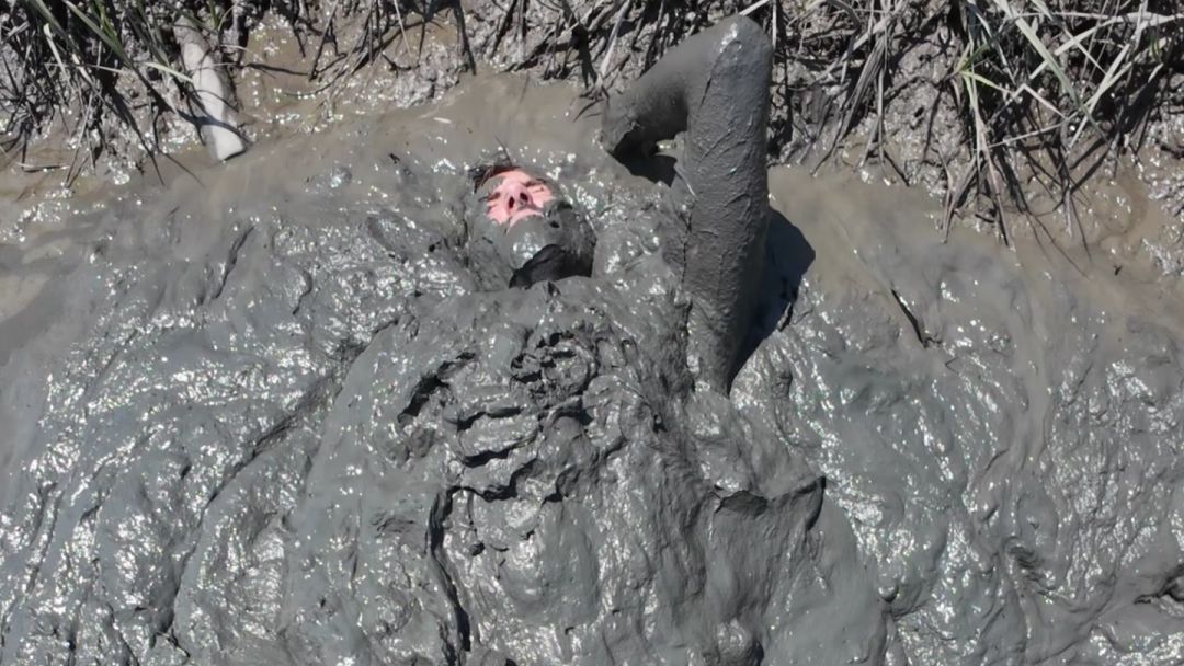 Engulfed and Edging in Creamy Marsh Mud: - UMD